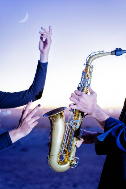 Free Stock Photo of Young woman playing the saxophone | Download Free ...