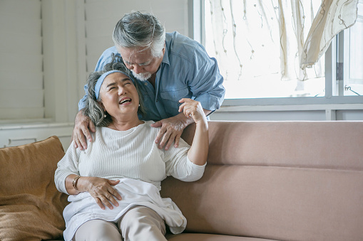 Happy Old Asian Husband Take Care And Massage Shoulder Elderly Wife