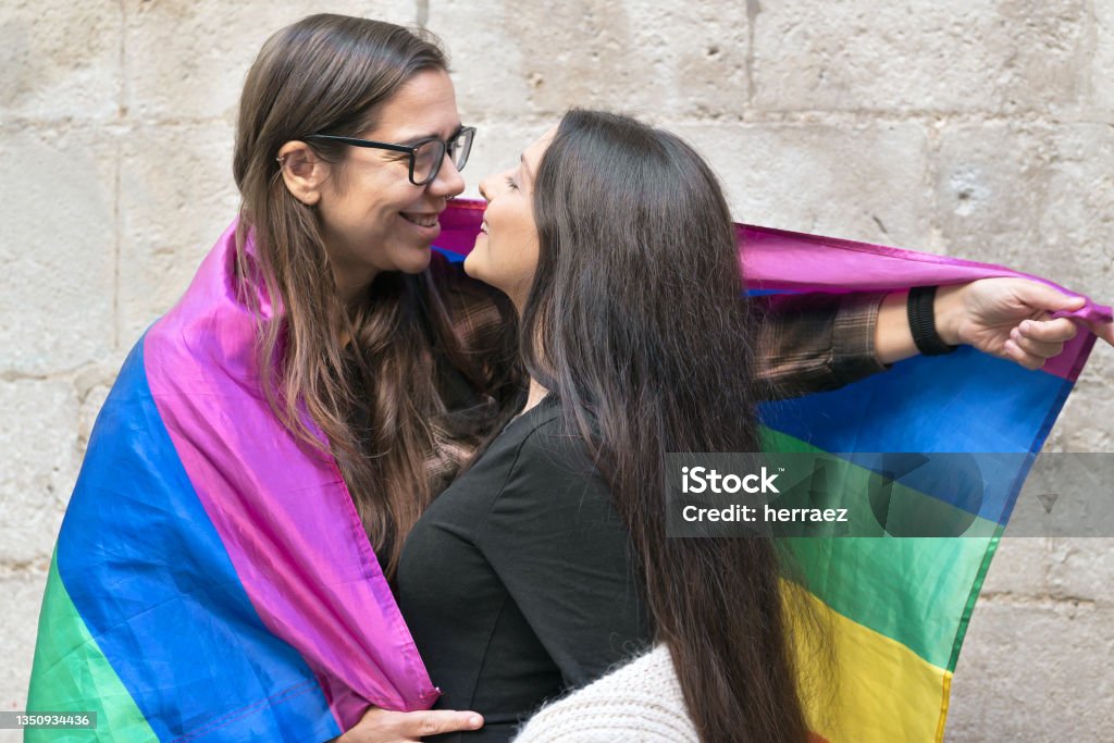 Portrait Of An Affectionate Young Lesbian Couple Hugging Each Other