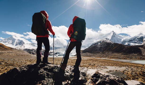 Free picture: Two backpack mountain climbers at snowy mountain