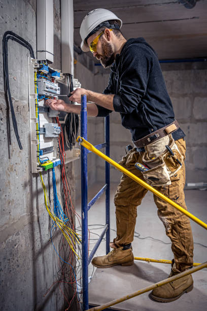 Free Stock Photo of Electrician working on electrical panel | Download ...
