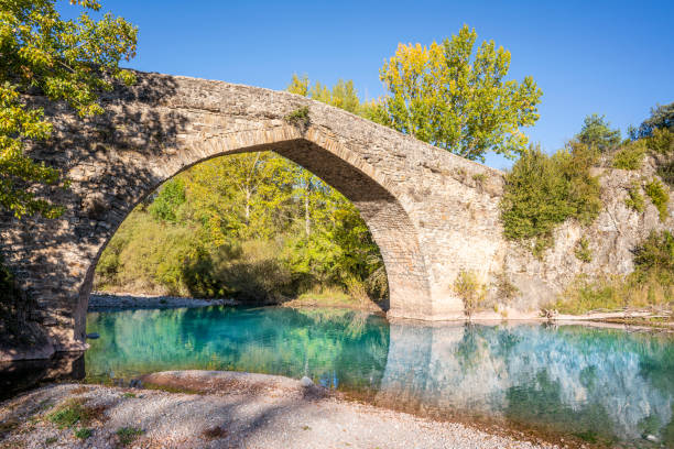 Free picture: Medieval stonework bridge in forest with rocky river