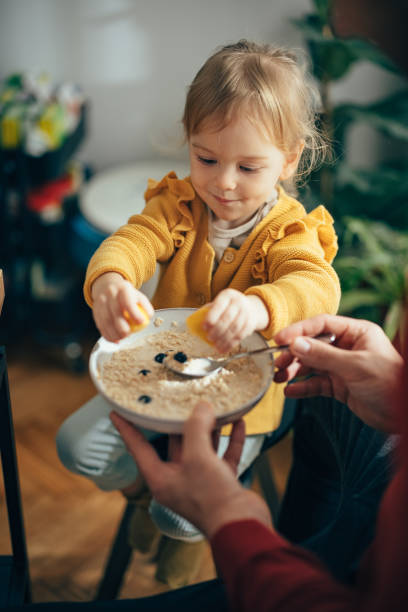 200+ Daughter Feeding Her Father Cereal Stock Photos, Pictures ... 200+ Daughter Feeding Her Father Cereal Stock Photos, Pictures ...