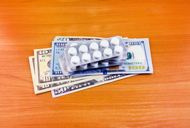 Free Stock Photo of Pile of Money and Pills Next to Pack of Pills ...