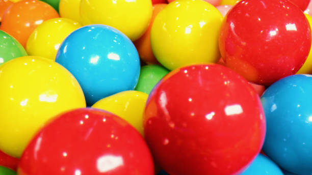 Free Stock Photo of Close of a spoonful of colorful candy balls ...