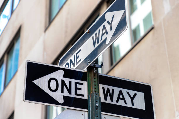 Free Stock Photo of Urban scene with dual one-way street signs ...