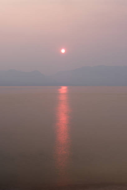 Free Stock Photo of Bright Colorful Sunset on the Beach - Hazy Looks ...
