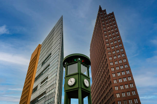 Free Stock Photo of Historic clock tower amidst modern buildings ...