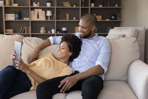 2,000+ Couple Making A Purchase Stock Photos, Pictures & Royalty-Free ... 2,000+ Couple Making A Purchase Stock Photos, Pictures & Royalty-Free ...