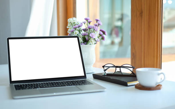 Free Stock Photo of A laptop with blank screen alongside glass flower ...