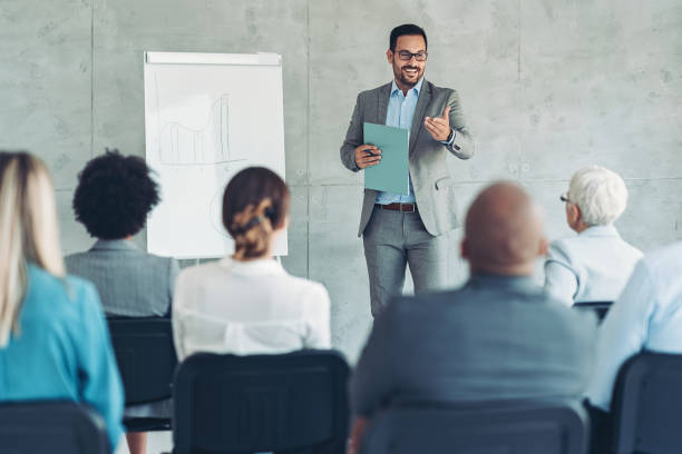 Free Stock Photo of Senior businesswoman speaker giving a presentation ...