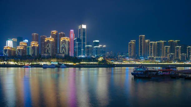Free Stock Photo of Nighttime Cityscape Across River | Download Free ...