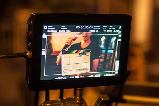 Videographer sets up a camera for recording – free photo on Barnimages