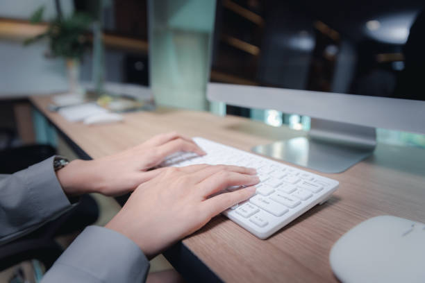 Free Stock Photo of Hands typing on multiple keyboards in an office ...