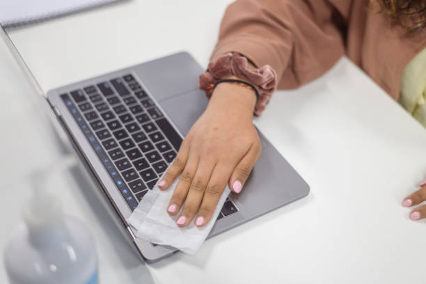 Free Stock Photo of Woman with sanitizing alcohol spray for computer ...