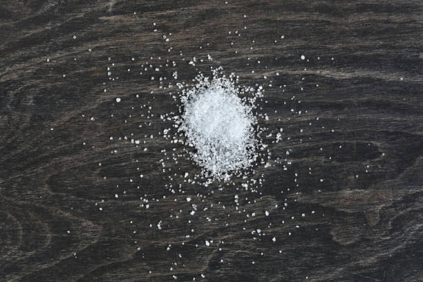 Free Stock Photo of A pile of white crystals on a wooden surface ...