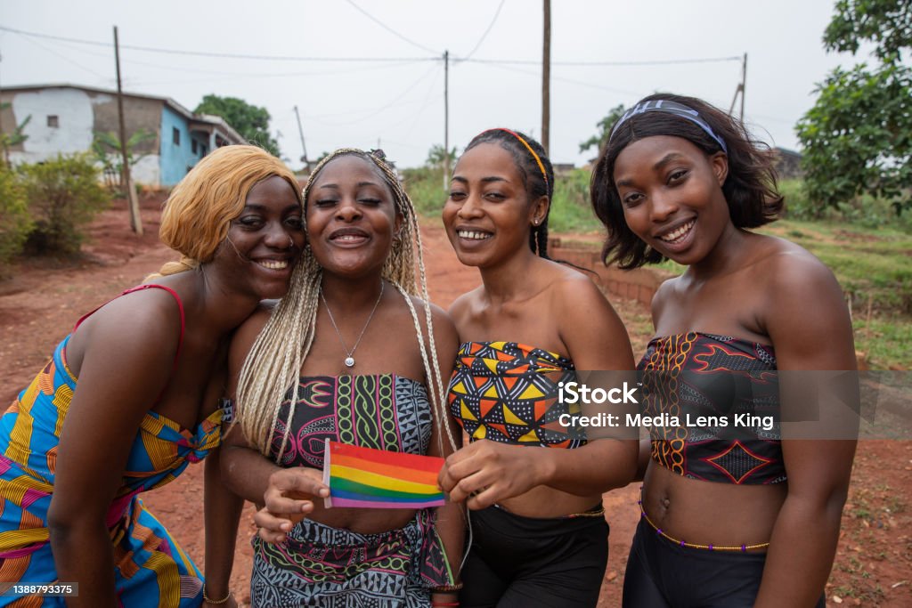 Group Of Smiling African Lesbian Girls Together With The Rainbow Flag Get Together Lgbtq In