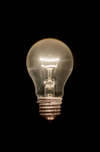 Free Stock Photo of Single glowing light bulb on dark background ...
