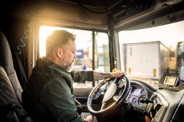 Free Stock Photo of Man Driving a Truck With a Steering Wheel ...