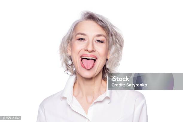 Shot Of A Beautiful Mature Woman Having Fun And Teasing Sticking Out