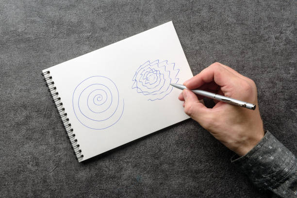 Free Stock Photo of Overhead view of a hand drawing art in a notebook ...