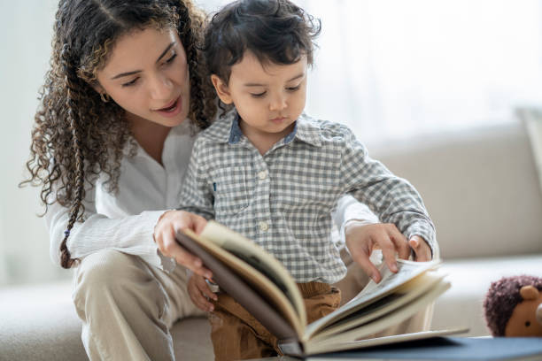 Free Stock Photo of Parent and child reading a book together | Download ...