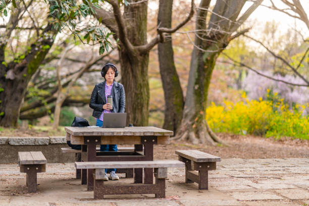 Free Stock Photo of Remote work concept in a public park setting ...