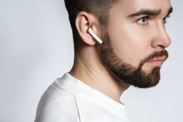 Free Stock Photo of Man Wearing Bluetooth Earbuds | Download Free ...
