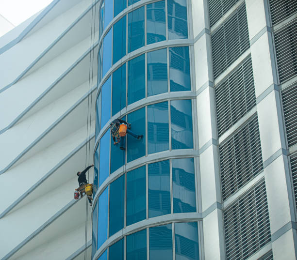 Free Stock Photo of Window washer on high-rise building facade ...