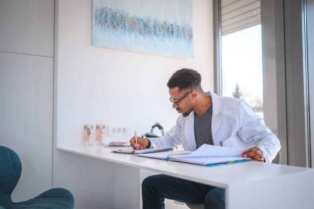 Free Stock Photo of Doctor writing notes | Download Free Images and ...