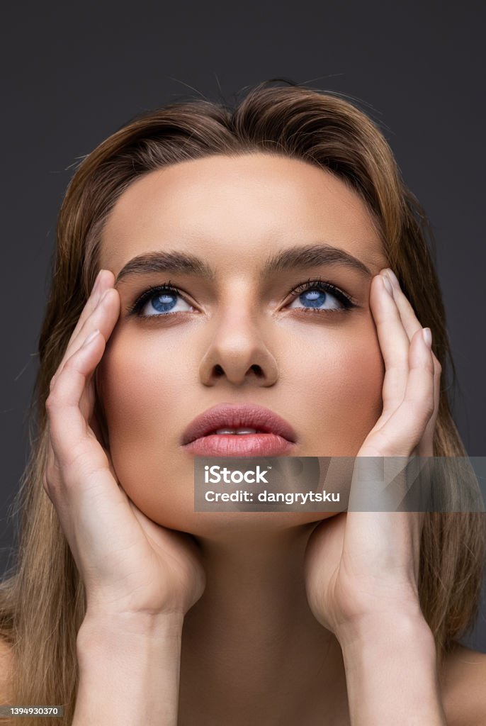 Beauty Face Young Woman Natural Healthy Cosmetic Skin Isolated On Gray