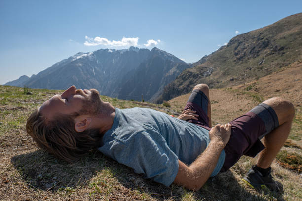 Free Stock Photo of Man Laying on Ground in Front of Stage | Download ...