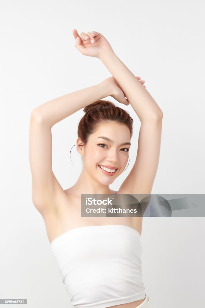 Beautiful Young Asian Woman Lifting Hands Up To Show Off Clean And