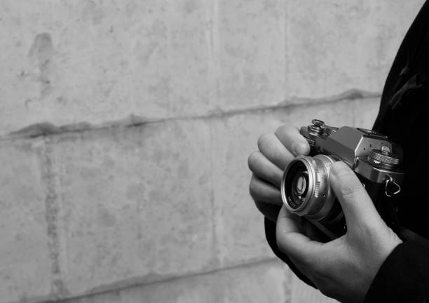 Free Stock Photo of Woman using vintage camera taking picture of her ...