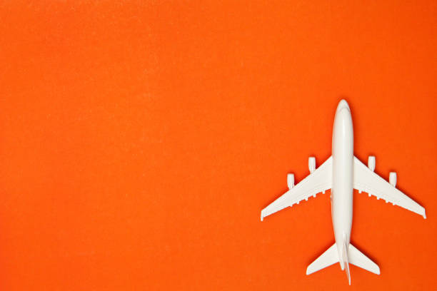 Free picture: Photomontage of an orange toy-airplane in the form of an ...