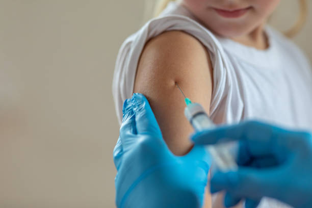Free picture: checking, smallpox, vaccination, scar, young child, forearm