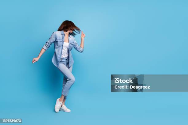 Photo Of Sweet Adorable Woman Wear Jeans Shirt Dancing Empty Space