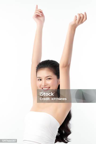 Beautiful Young Asian Woman Lifting Hands Up To Show Off Clean And