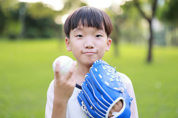 Free Stock Photo of Young Boy Wearing Hat Holding Baseball Glove ...