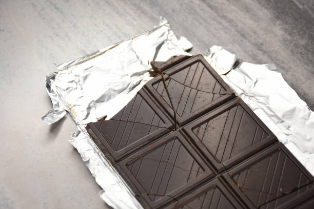 Free Stock Photo of Three Pieces of Chocolate on Tin Foil | Download ...