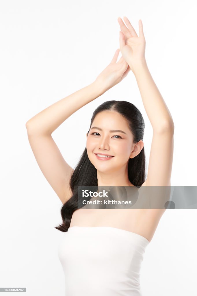 Beautiful Young Asian Woman Lifting Hands Up To Show Off Clean And