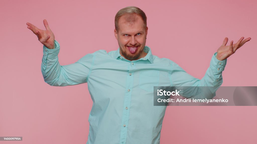 Funny Joyful Man Making Playful Silly Facial Expressions Grimacing