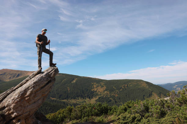 Free Stock Photo of Man on a Hill in a Rocky Landscape | Download Free ...