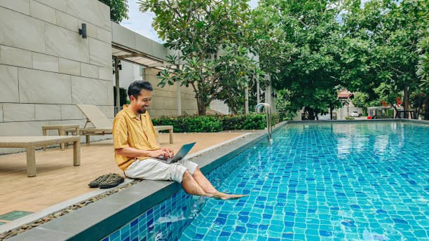 Free Stock Photo of Man Sitting Next to Swimming Pool | Download Free ...