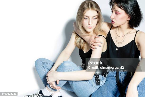Two Winsome Lovely Relaxing Caucasian Lesbians Embracing With Hug Communicating With Each Other