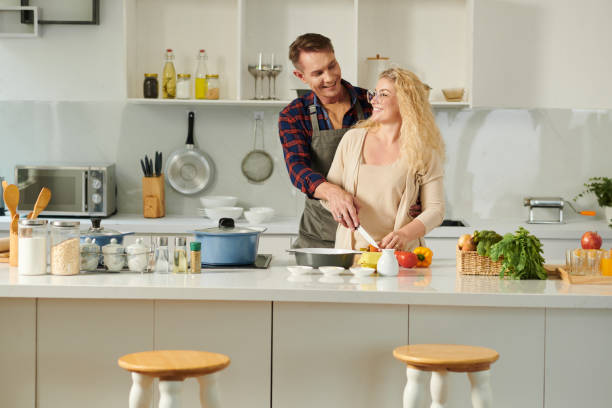 Free Stock Photo of Couple having a fun cooking moment | Download Free ...