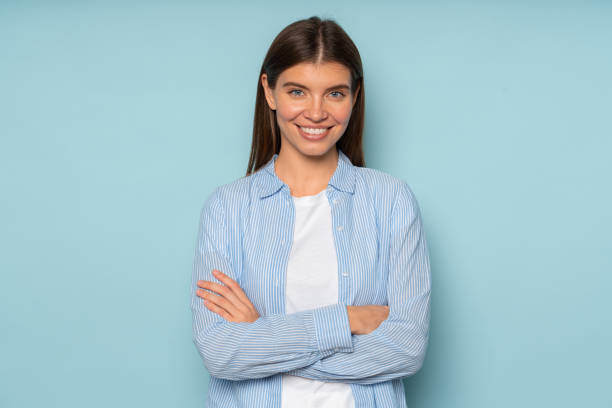 560 Portrait Of Smiling Business Woman With Folded Hands Isolated On