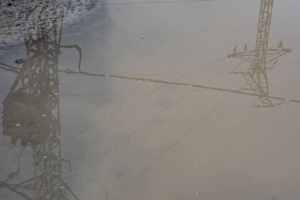Free picture: Telephone pole reflection shadow on water level surface