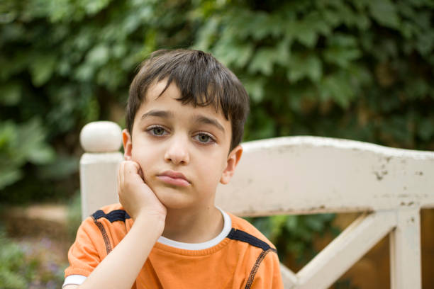 Free Stock Photo of Sad little boy waiting outside | Download Free ...
