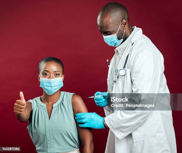 African American Covid Vaccinated Woman Showing Thumbs Up Sign And ... African American Covid Vaccinated Woman Showing Thumbs Up Sign And ...